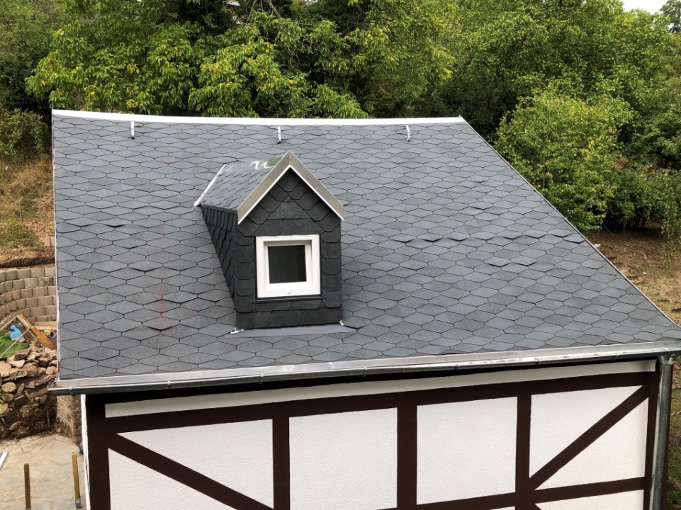 Buckled shingles: How did my new shingle roof become wrinkled? | Iko